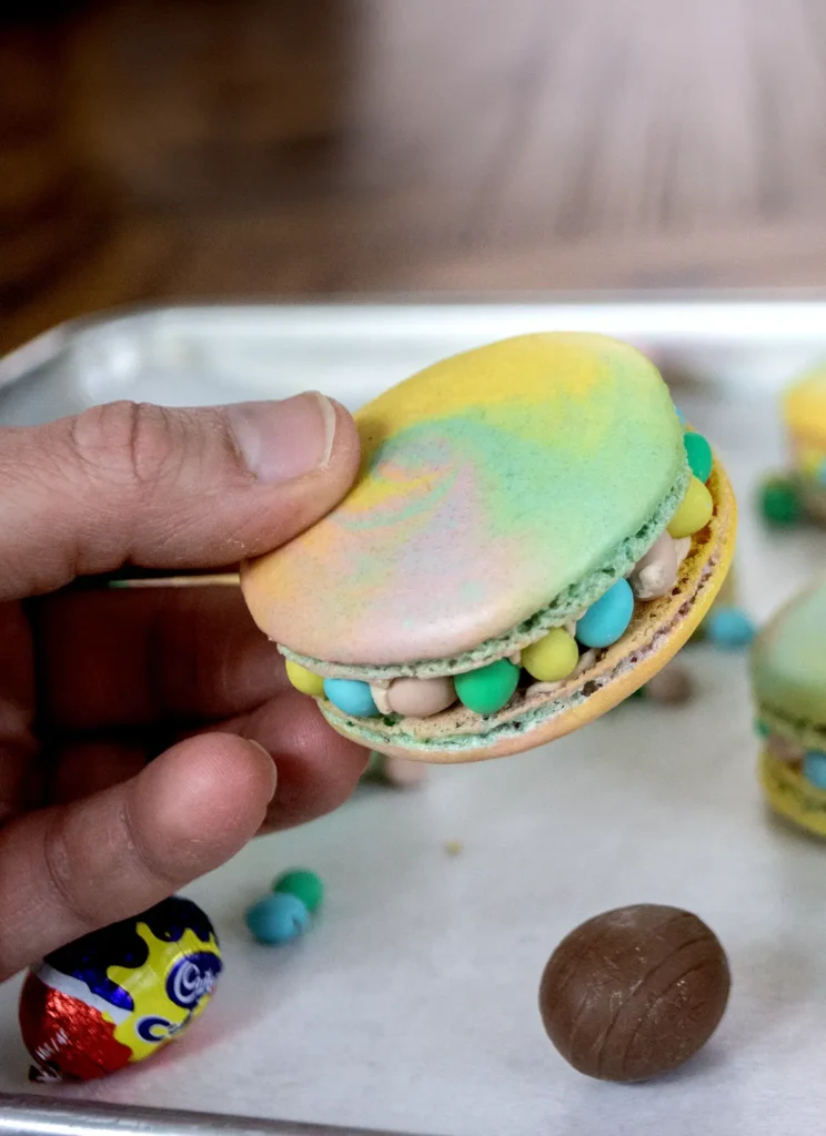 Cadbury Creme Egg Macarons with Tie-Dye Shells - Lowbrow Fancy
