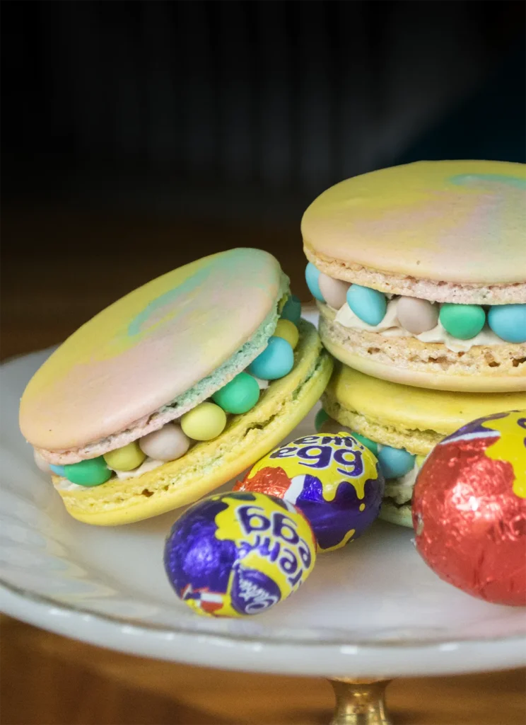Cadbury Creme Egg Macarons with Tie-Dye Shells - Lowbrow Fancy